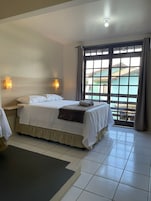 Apartamento família, vista para o mar | Berços grátis, camas extras/dobráveis (sobretaxa), Wi-Fi de cortesia