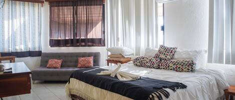 Suíte júnior, vista para a cidade | TV