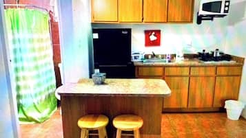 Quarto Executivo | Cozinha privada