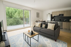 Apartamento | Sala de estar | TV de ecrã plano 