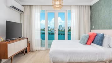 Apartamento luxo, 1 quarto, geladeira e micro-ondas, vista para a lagoa | Individualmente decorados, individualmente mobiliados