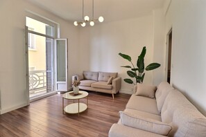 Apartamento conforto, ar-condicionado | Área de estar