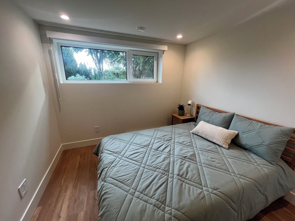 Enjoy the mountains and the ocean from this clean and cozy Deep Cove ...