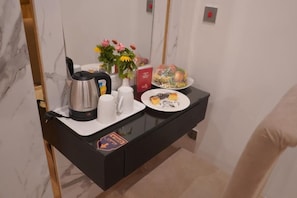 Quarto casal luxo | Área de estar
