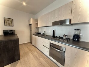 Apartamento, 1 quarto, para fumantes, terraço | Parte interna