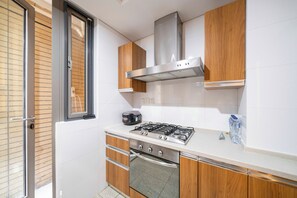 Apartamento Superior, 2 quartos, Vista para a cidade | Cozinha privada