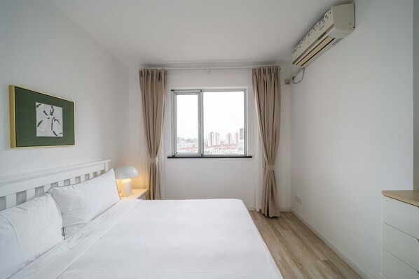 Apartamento superior, sacada, vista para a cidade | Ferros/tábuas de passar roupa, Wi-Fi de cortesia