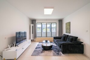 Apartamento Superior, 3 quartos, varanda, Vista para a cidade | Sala