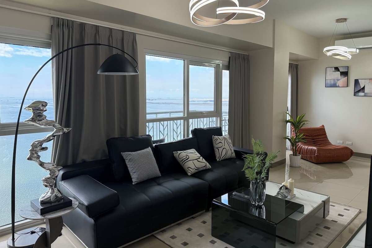 Apartamento Deluxe, varanda, vista para o mar | Sala de estar