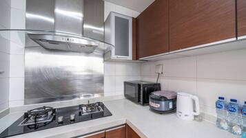 Apartamento superior, 3 quartos, cozinha, vista para a cidade | Cozinha americana privada
