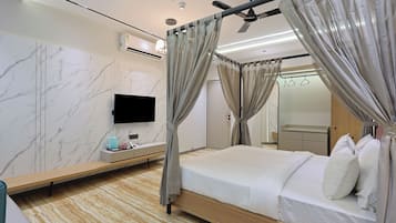 Suíte, vista para a cidade | Wi-Fi de cortesia, acesso para cadeiras de rodas