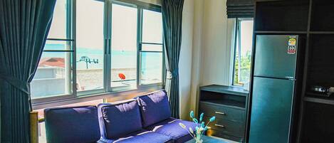 Apartamento, 1 quarto, fumadores | Sala