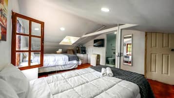 Quarto família | Frigobar, Wi-Fi de cortesia, roupa de cama