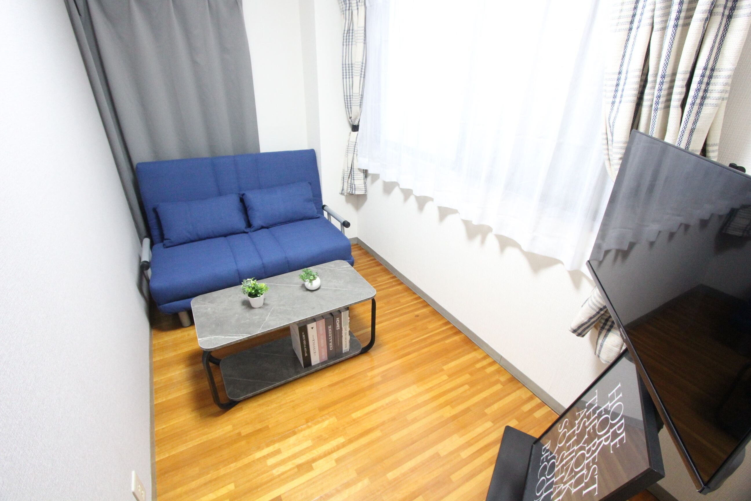 Quarto triplo standard | Área de estar