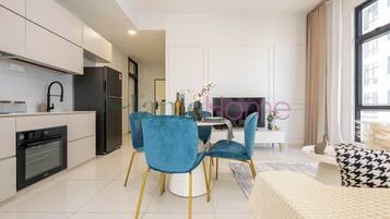 Suite Deluxe, 2 quartos, não fumadores | Sala de jantar