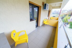 Quarto solteiro, vista para a cidade | Terraço/pátio
