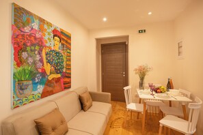 Apartamento Comfort, Vista para a cidade | Sala de estar