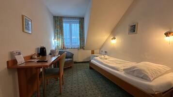 Quarto Individual Básico | Quartos insonorizados, roupa de cama fornecida