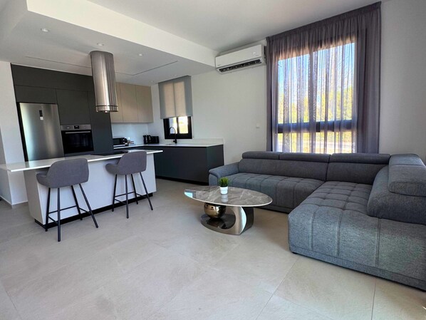 Apartamento, 2 quartos | Sala de estar