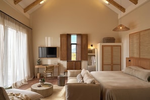 Quarto Duplo de Luxo, vista para o oceano | Minibar grátis, secretária