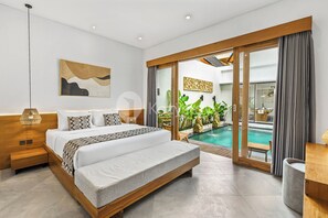 Villa, 2 quartos, varanda, vista para a piscina | Secretária, secretária adequada para computadores portáteis 