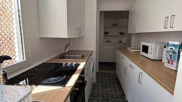 Apartamento, 2 quartos | Cozinha privada