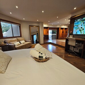 Suíte estúdio conforto | Área de estar