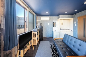 Apartamento | Área de estar | TV de tela plana