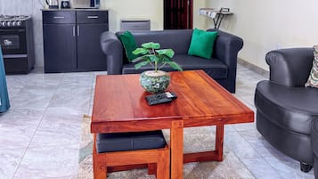 Apartamento Deluxe, varanda, Vista para a cidade | Sala de estar