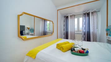 Quarto standard, vista para a cidade | Roupa de cama