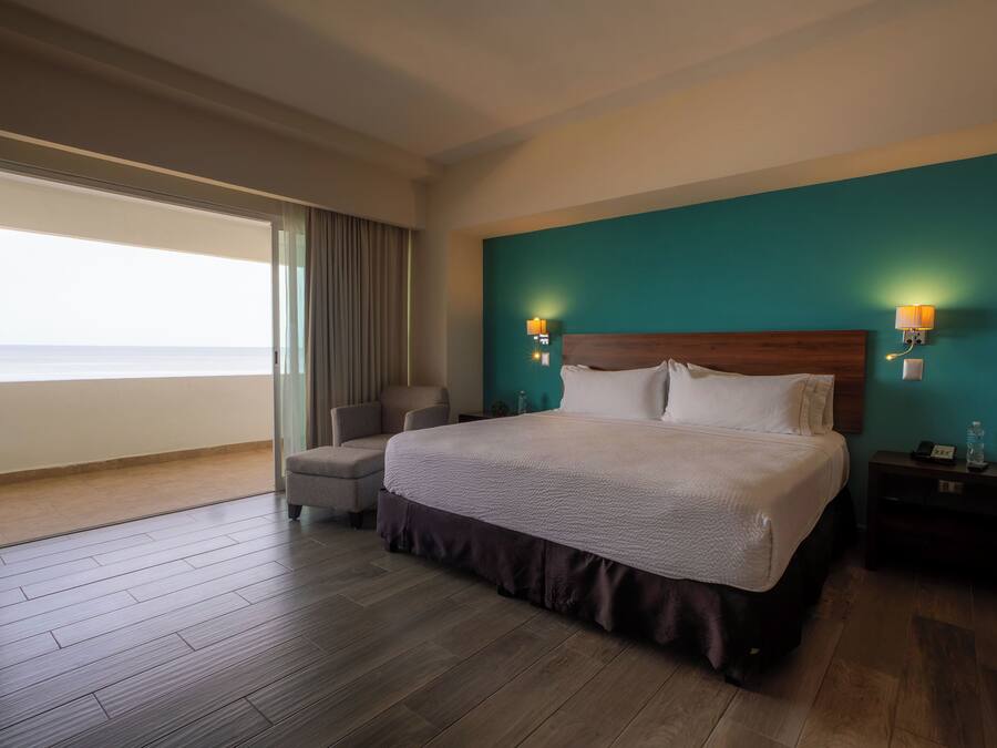 Suíte estúdio luxo, vista para o mar | Roupas de cama premium, cofres nos quartos, cortinas blackout