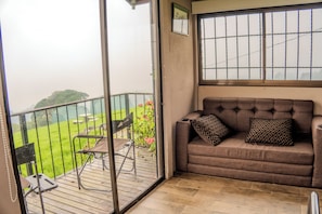 Quarto Duplo ou Twin Deluxe, Vista para a cidade | Sala de estar