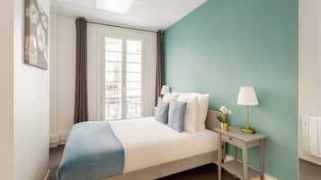 Apartamento | Roupa hipoalergénica, camas de colchão pillowtop, cofre no quarto