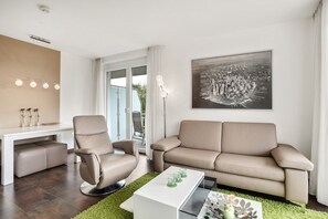 TV de tela plana 90 cm com canais a cabo