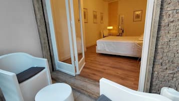 Quarto Duplo Deluxe, vista para o jardim | Vista para o jardim