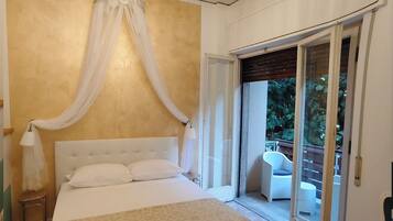 Quarto Duplo Superior, vista para o jardim | Ferro/tábua de engomar, Wi-fi grátis