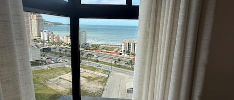 Apartamento Deluxe, vista para a praia | Vista para a praia ou o mar