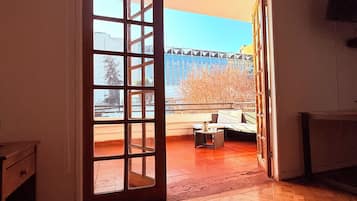 Quarto casal conforto, sacada, vista para a cidade | Terraço/pátio