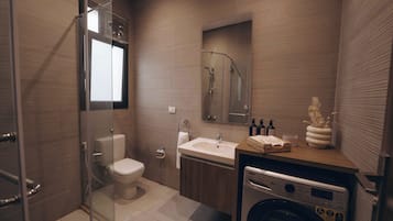 Apartamento Elite, Vista para a cidade | Casa de banho | Um polibã e uma banheira separados, artigos de higiene pessoal grátis