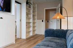 Suite Comfort, varanda | Cofre no quarto, cortinas/cortinados opacos, ferro/tábua de engomar 