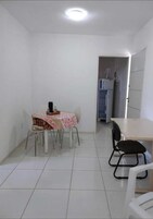 Apartamento família, 2 quartos, vista para o jardim | Sala de estar