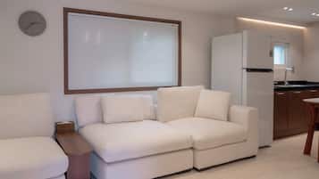 Suite Premium | Sala de estar | Smart TV de 43 polegadas com canais digitais