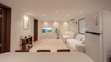 Suite Premium | Sala de estar | Smart TV de 43 polegadas com canais digitais