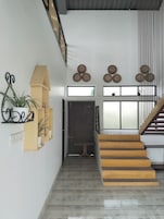 Um interior moderno com escada, prateleiras de madeira com plantas e arte decorativa na parede.