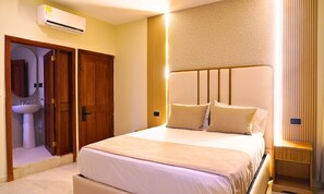 Quarto Deluxe | Casa de banho | Toalhas fornecidas 