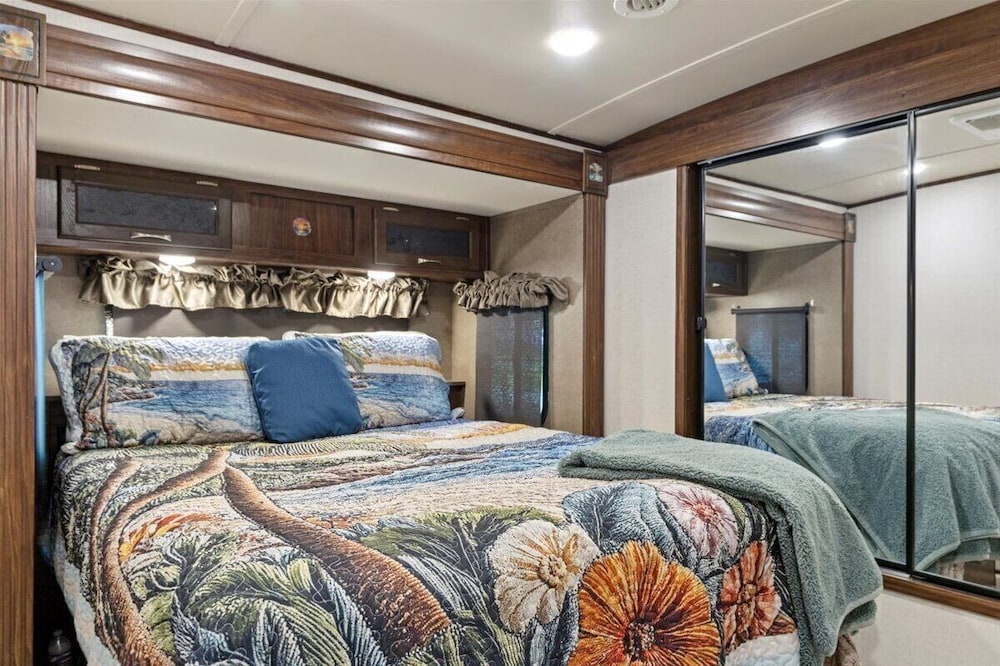 Spacious luxury RV with large kitchen/living room area, private bedroom ...