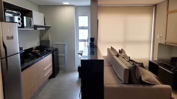 Apartamento Básico | Sala de estar | Smart TV de 32 polegadas com canais digitais