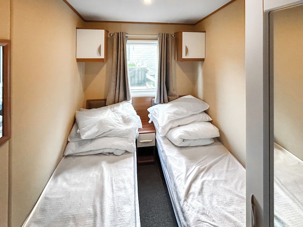 Spacious caravan sleeps six, with private decking and master ensuite ...
