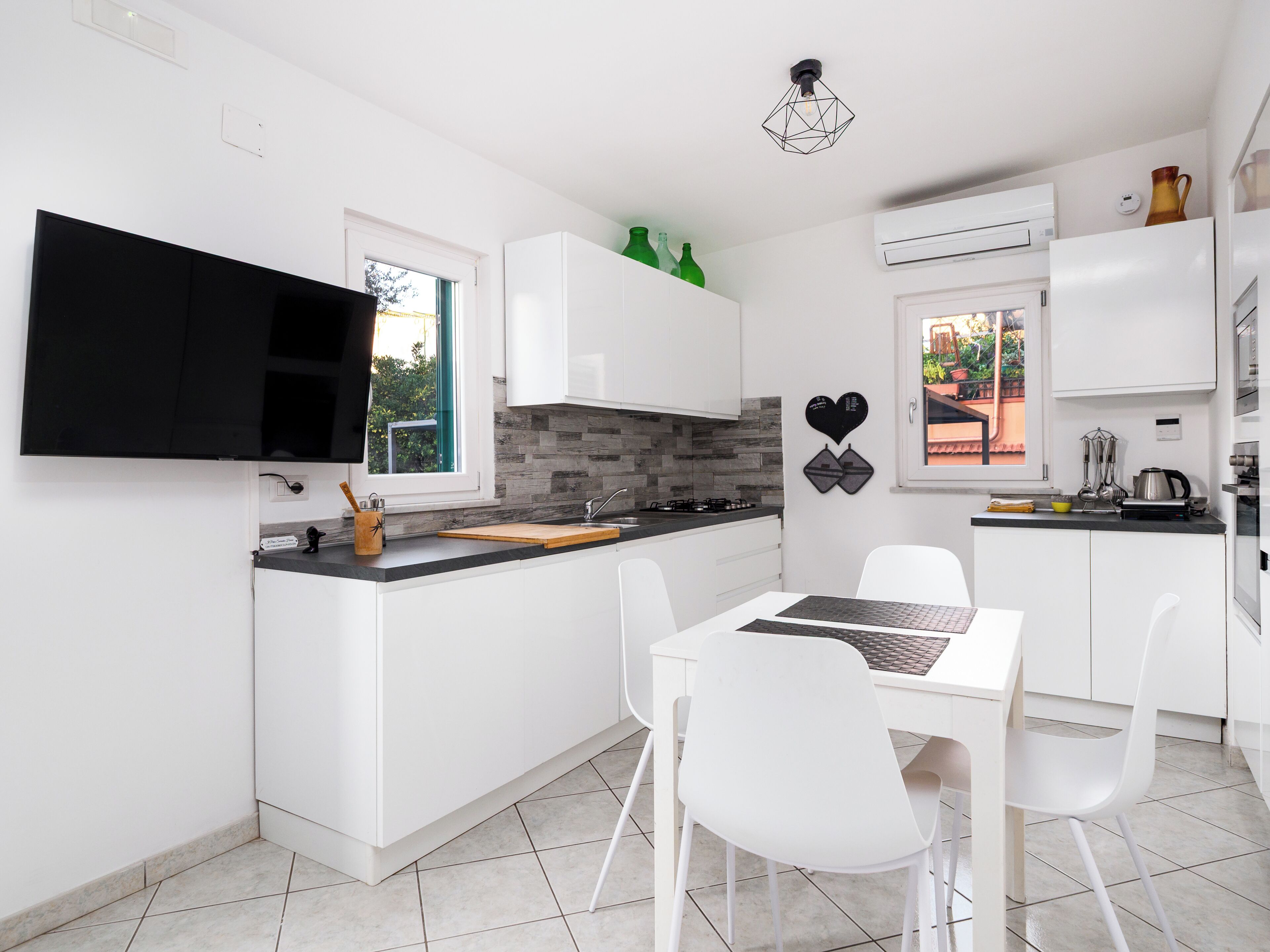 Casa Cidade | Cozinha privada | Um frigorífico, um micro-ondas, um forno, uma placa de cozinha 
