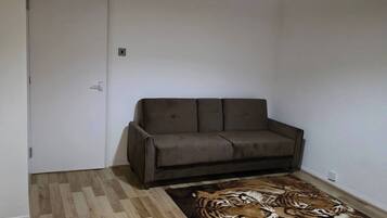 Apartamento, 1 quarto | Sala de estar